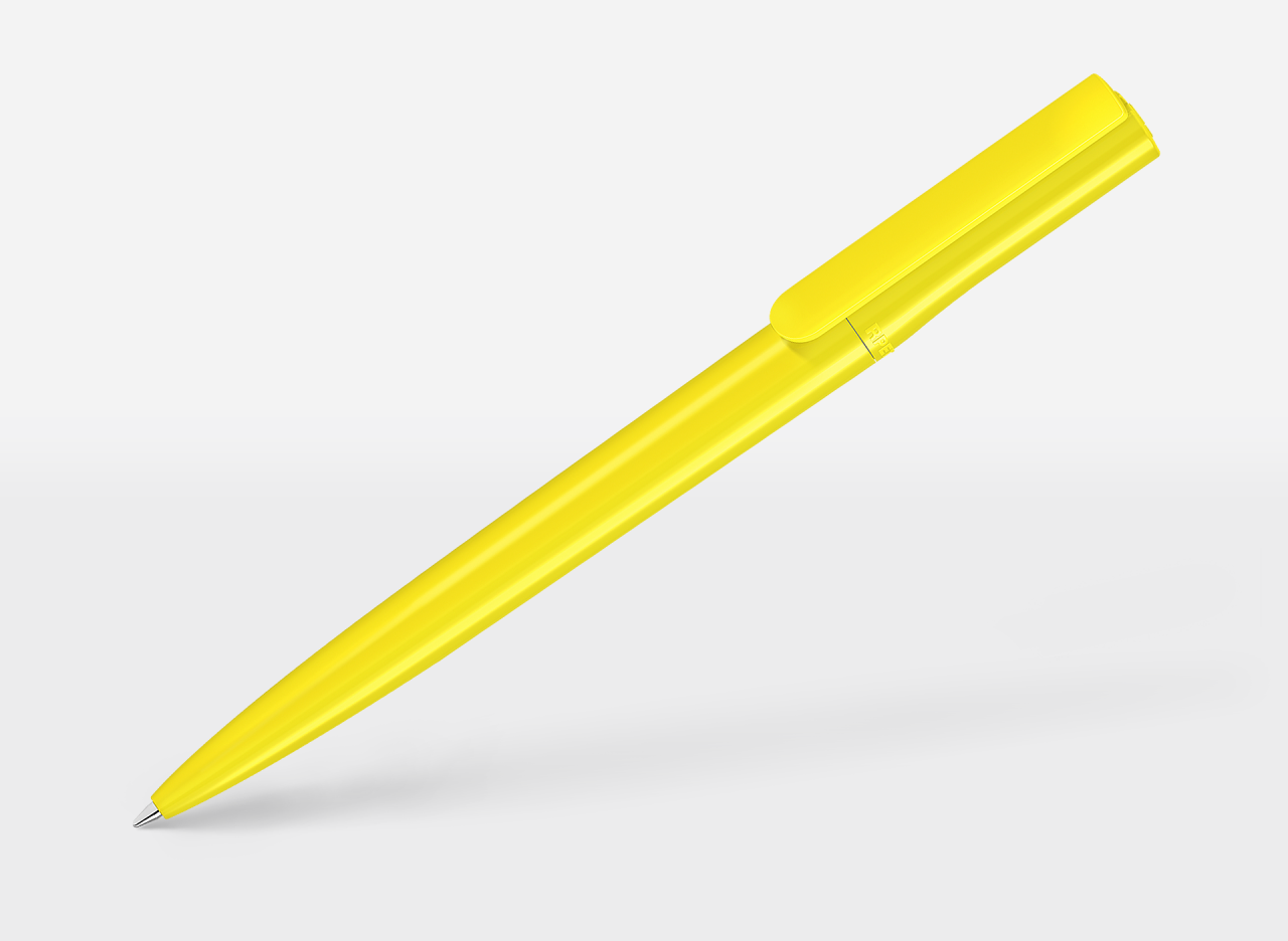 A twist-action ballpoint pen with a yellow barrel made from 100% ...