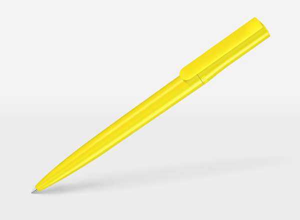 A twist-action ballpoint pen with a yellow barrel made from 100% ...